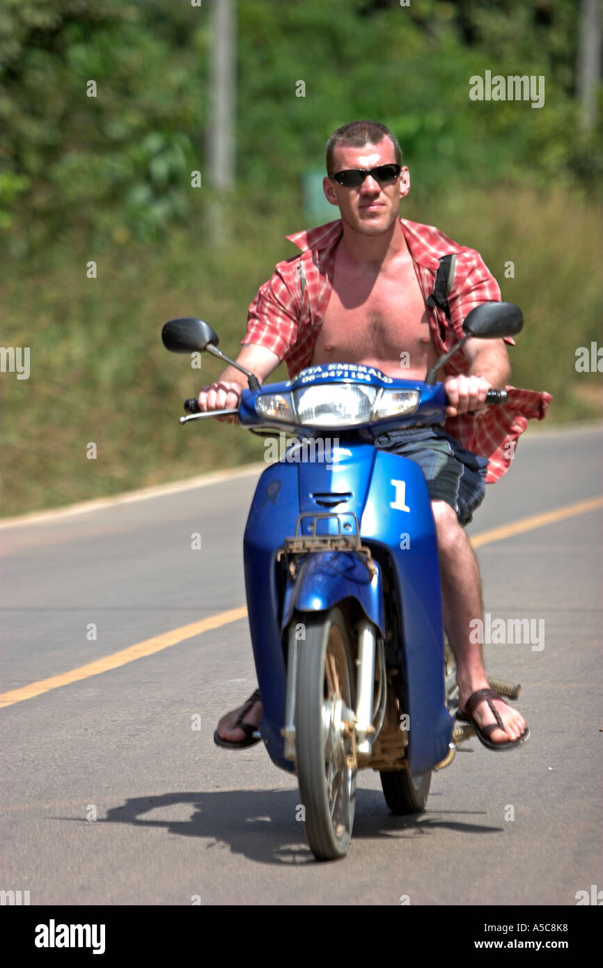 Motorbike rider without helmet hi-res stock photography and images - Alamy