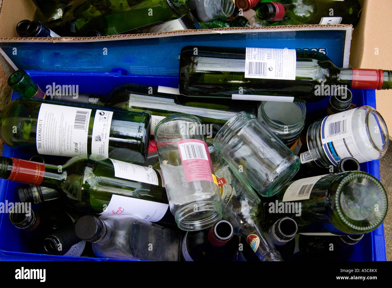 Stack of empty bottles and jars waiting to be recycled Stock Photo - Alamy