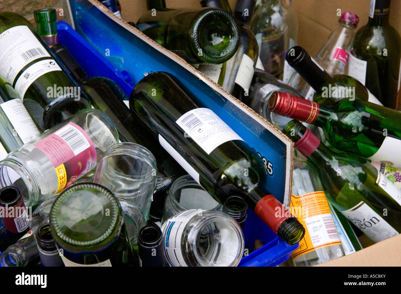 Stack of empty bottles and jars waiting to be recycled Stock Photo - Alamy