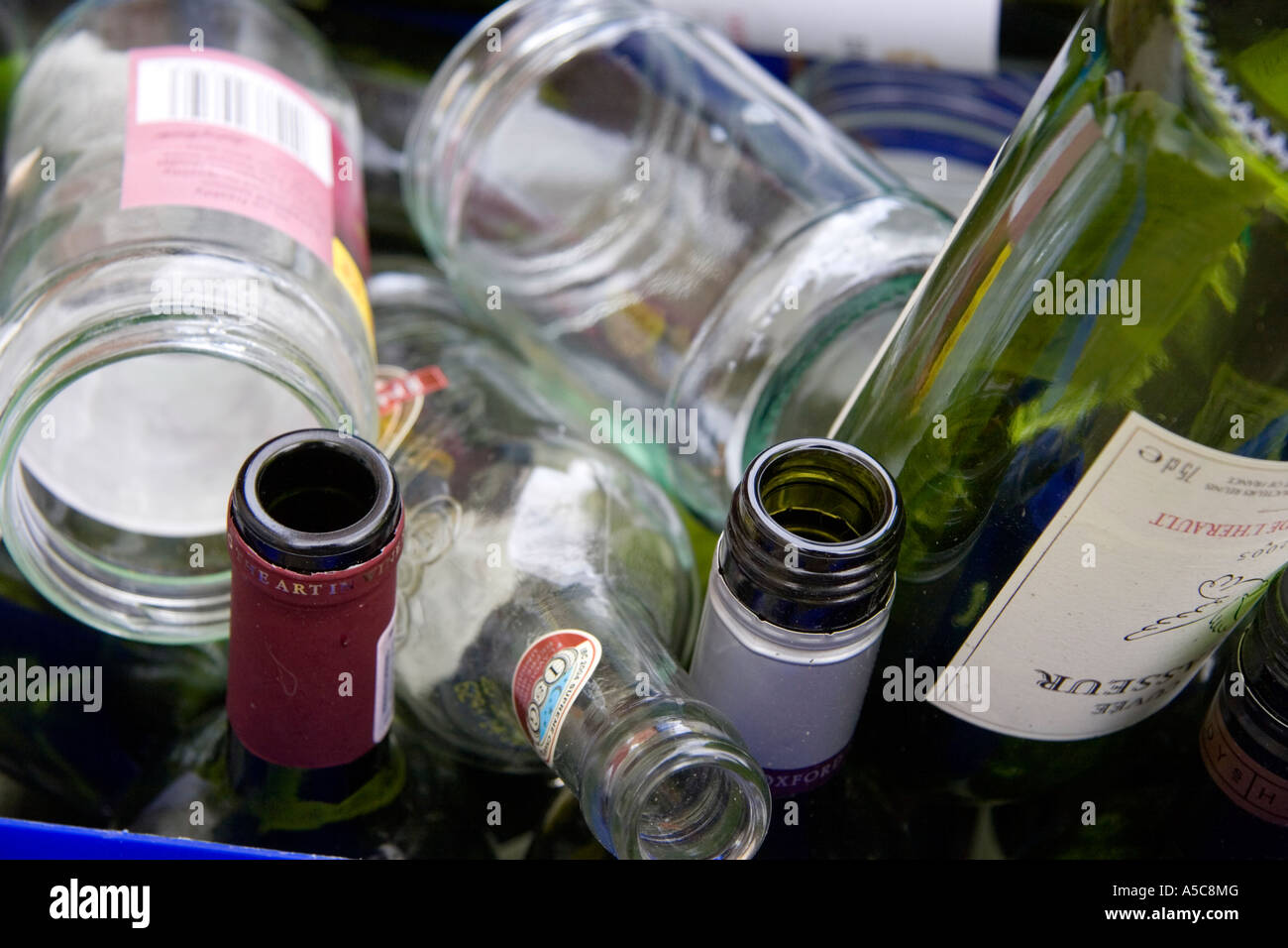 Stack of empty bottles and jars waiting to be recycled Stock Photo - Alamy