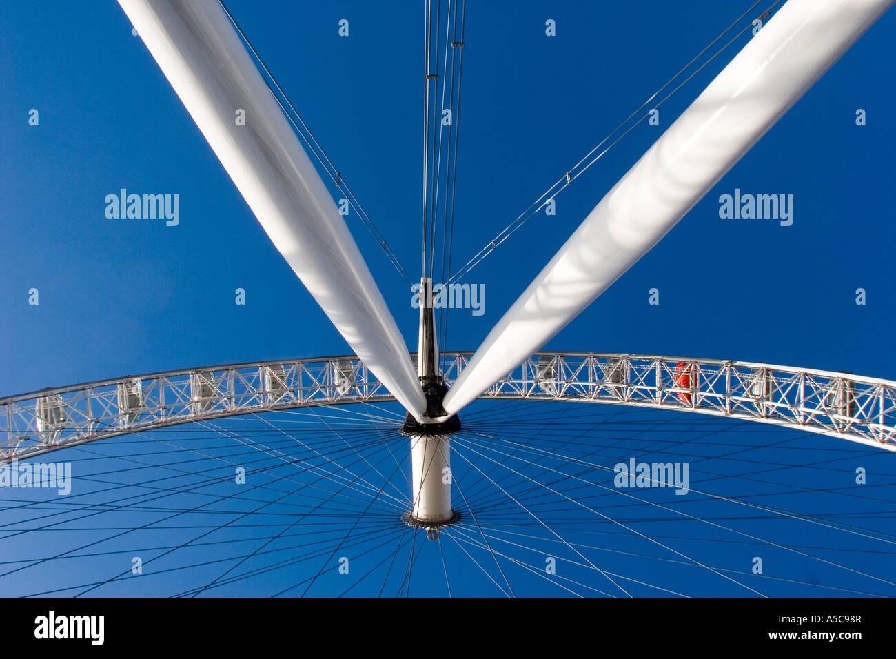 The London Eye against blue sky Stock Photo - Alamy