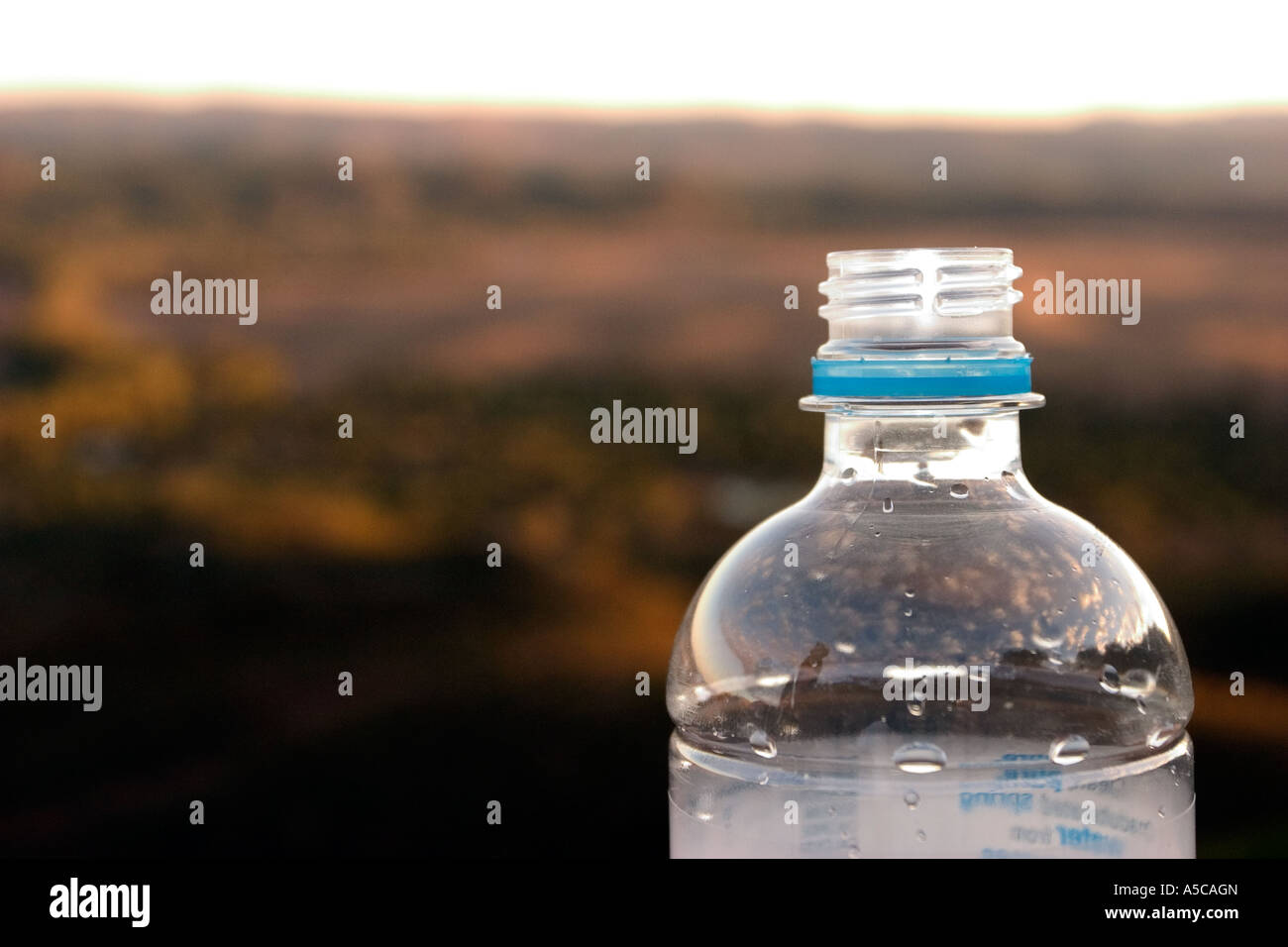 top of bottle in nature landscape Stock Photo - Alamy