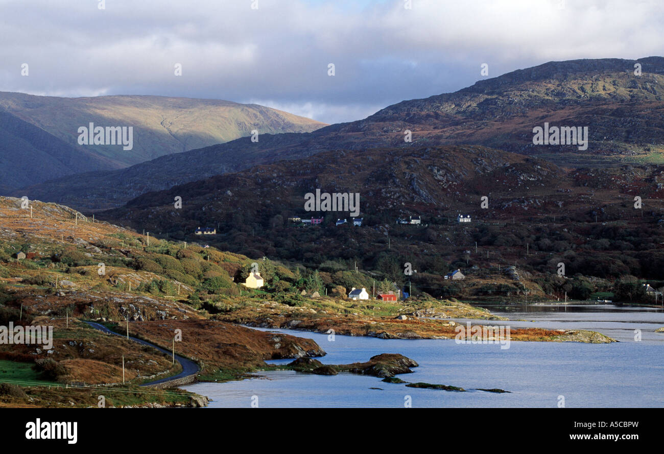 calm sea inlet with rugged mountains on irelands atlantic coast Stock ...