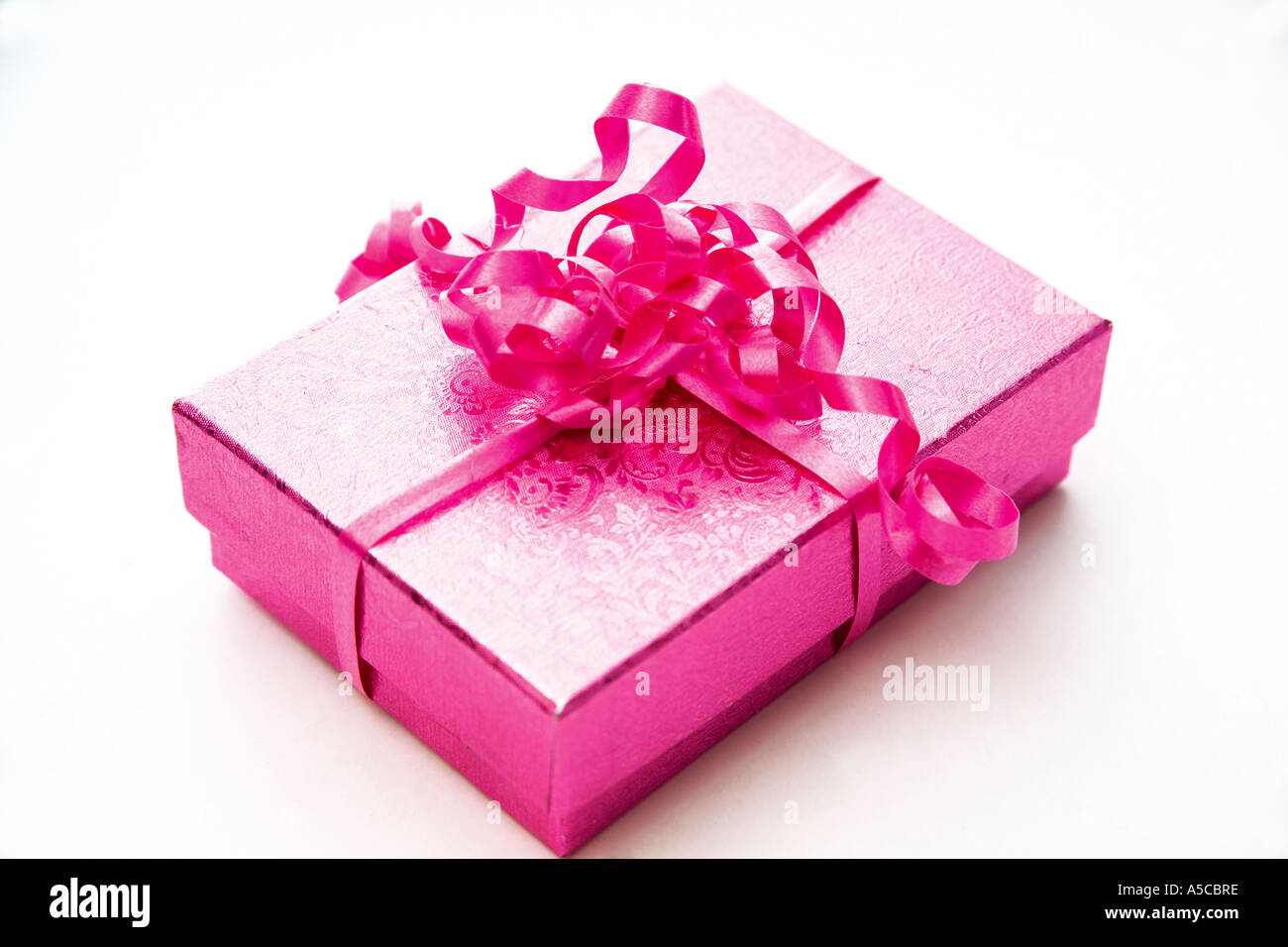 Gift wrapped with pink wrapping paper Stock Photo - Alamy