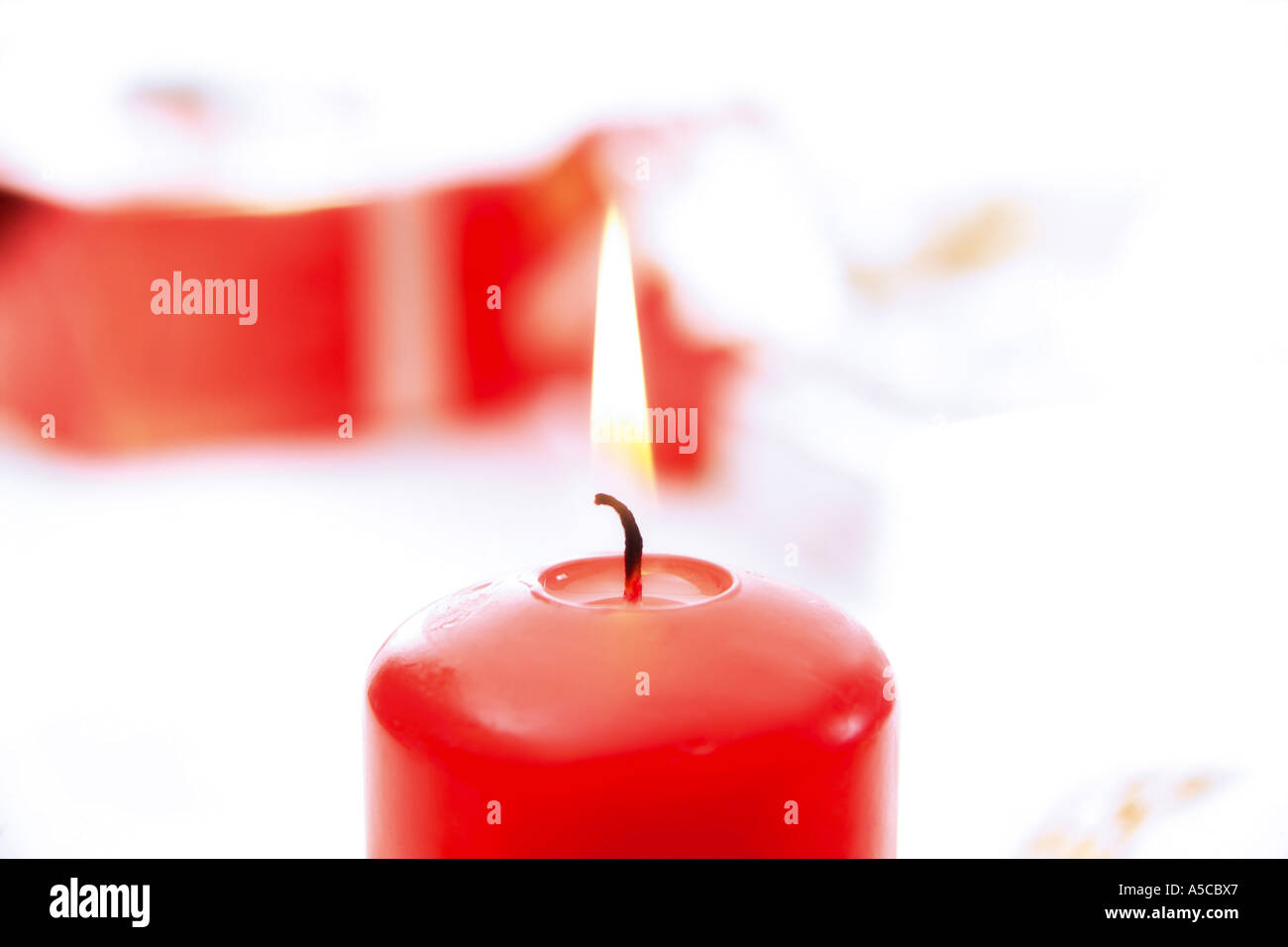 Red candle, burning Stock Photo - Alamy