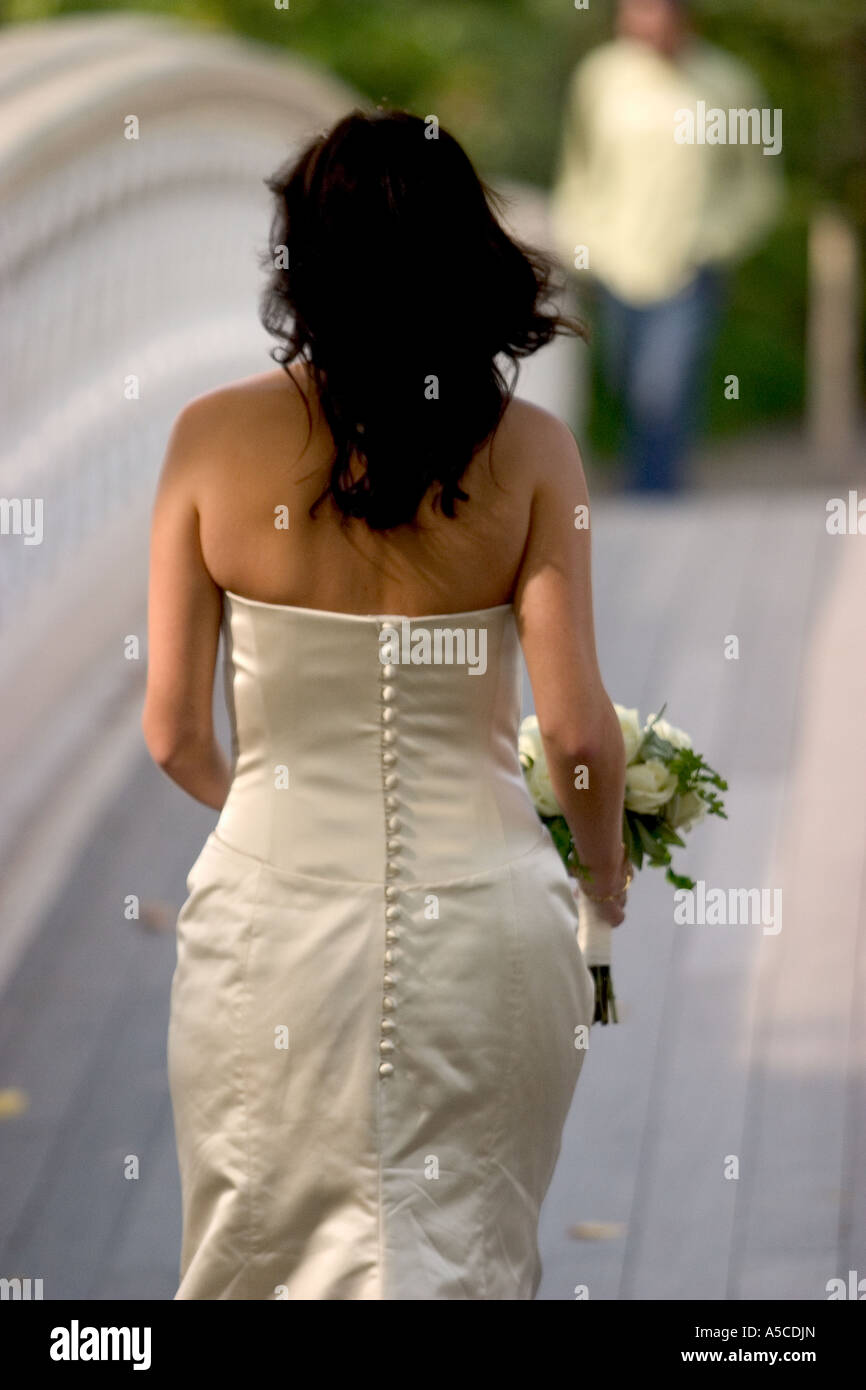 wedding dress woman on a new york bridge Stock Photo - Alamy
