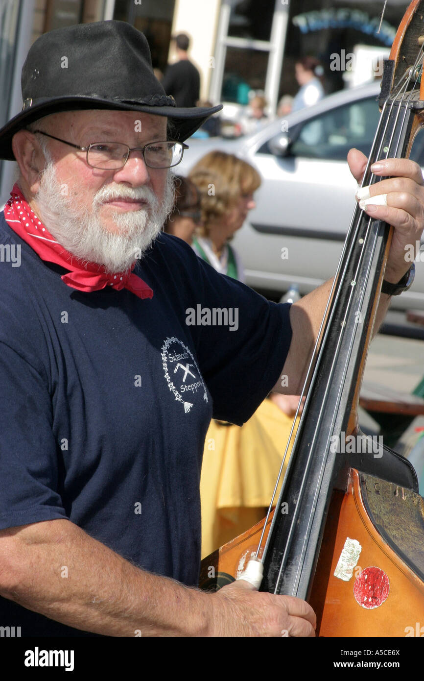 Terry Pearson playing bass for Sidmouth Steppers Stock Photo - Alamy