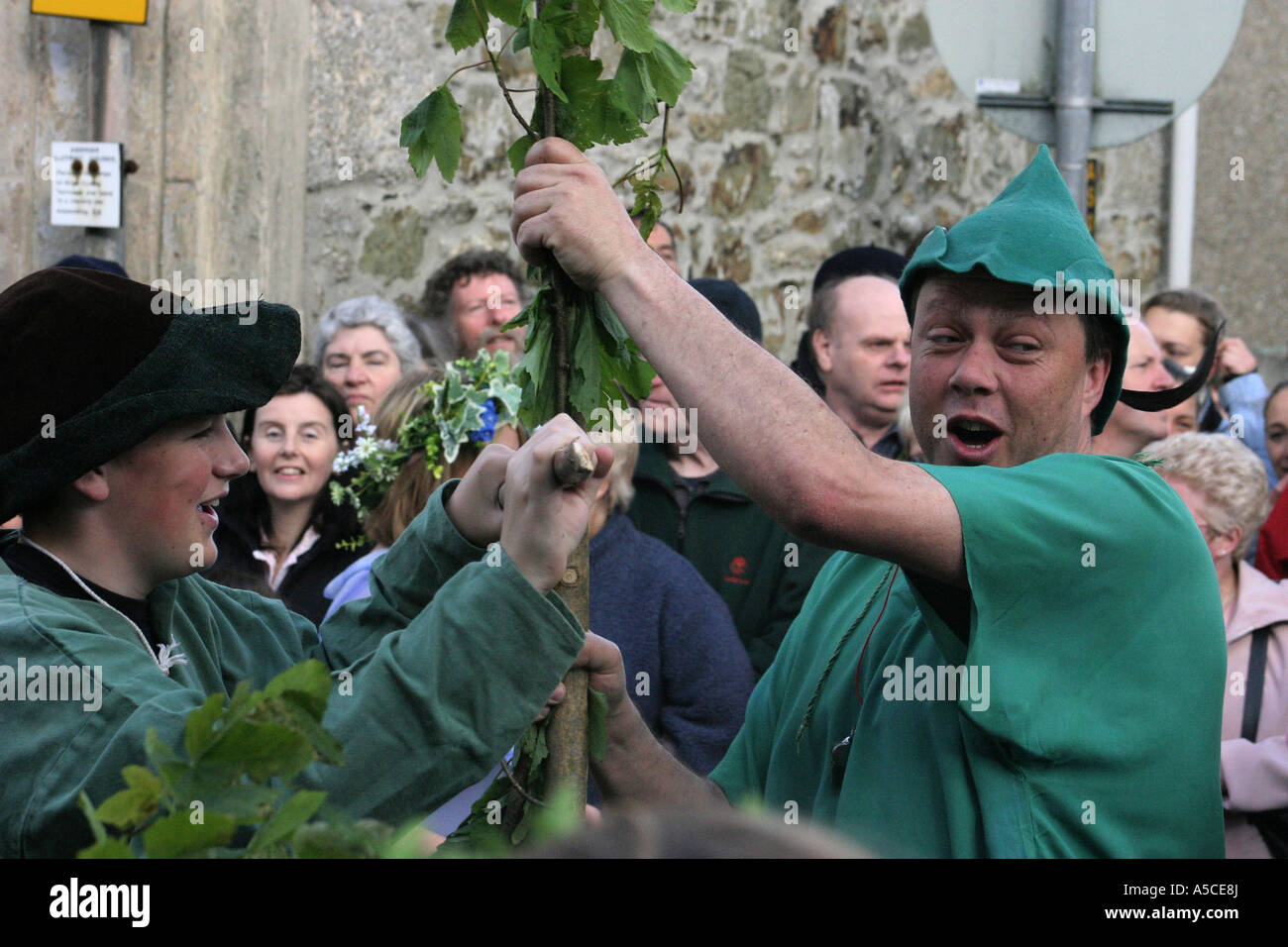 Robin Hood and Little John fight during Helston's celebration of May ...