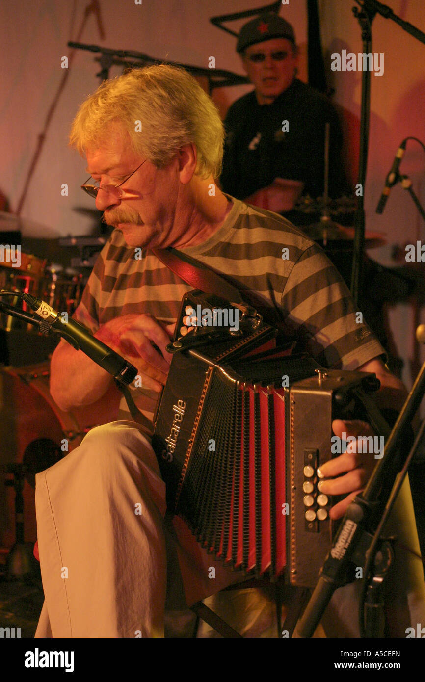 Rod Stradling playing melodeon with his band Tiger Moth at the Towersey ...