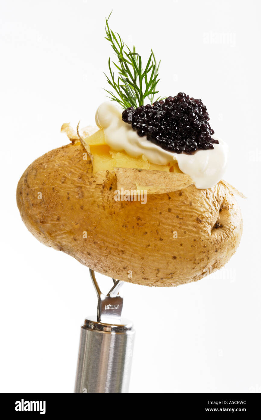 Potato with caviar, close-up Stock Photo - Alamy