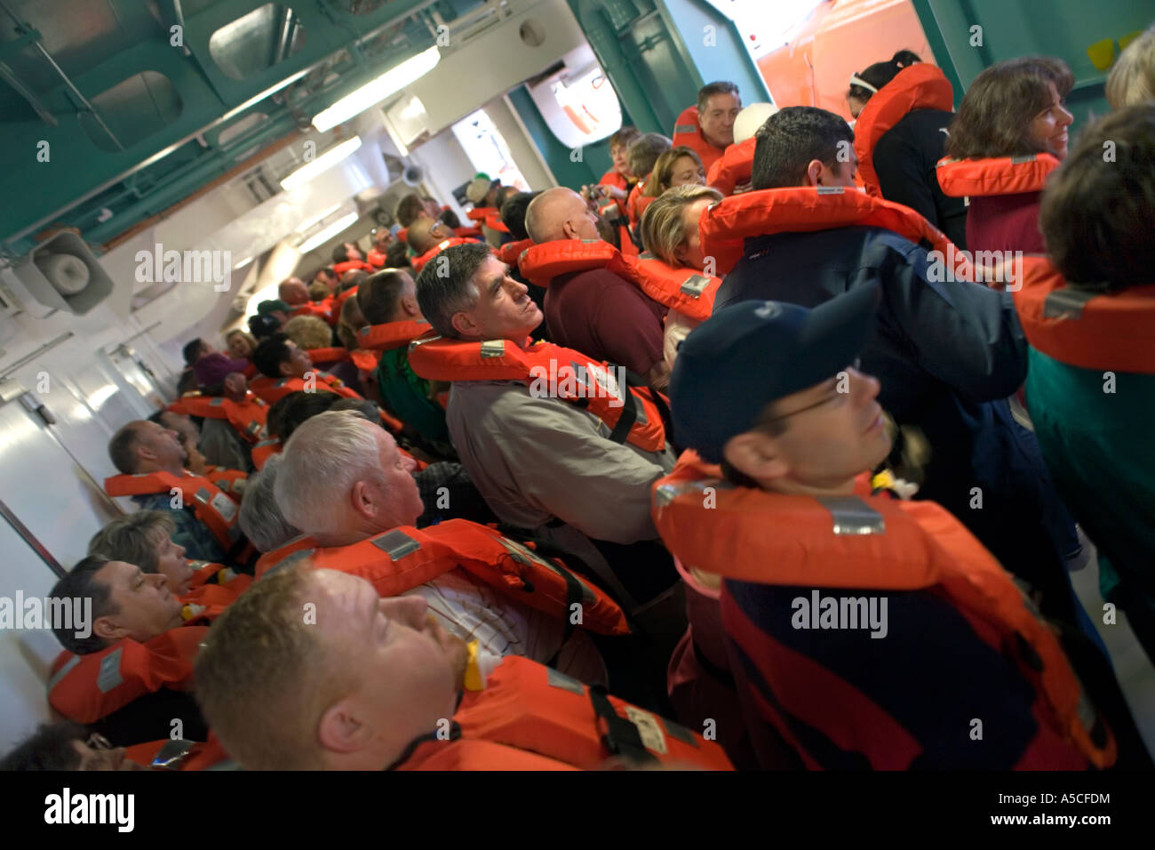 Abandon Ship cruise passenger getting ready Stock Photo - Alamy
