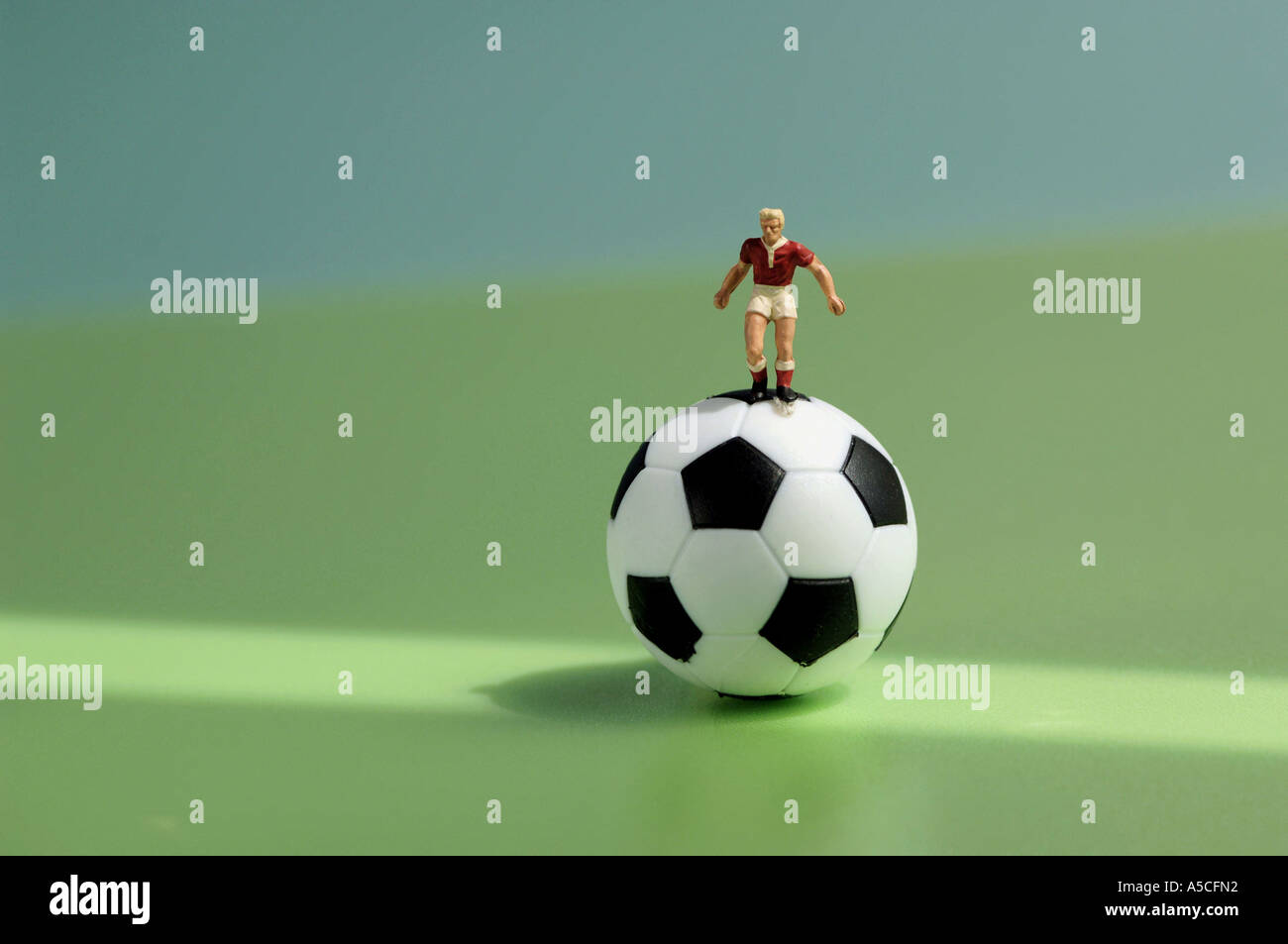 Toy Figurine On Football Stock Photo Alamy toy-figurine-on-football-stock-photo-alamy