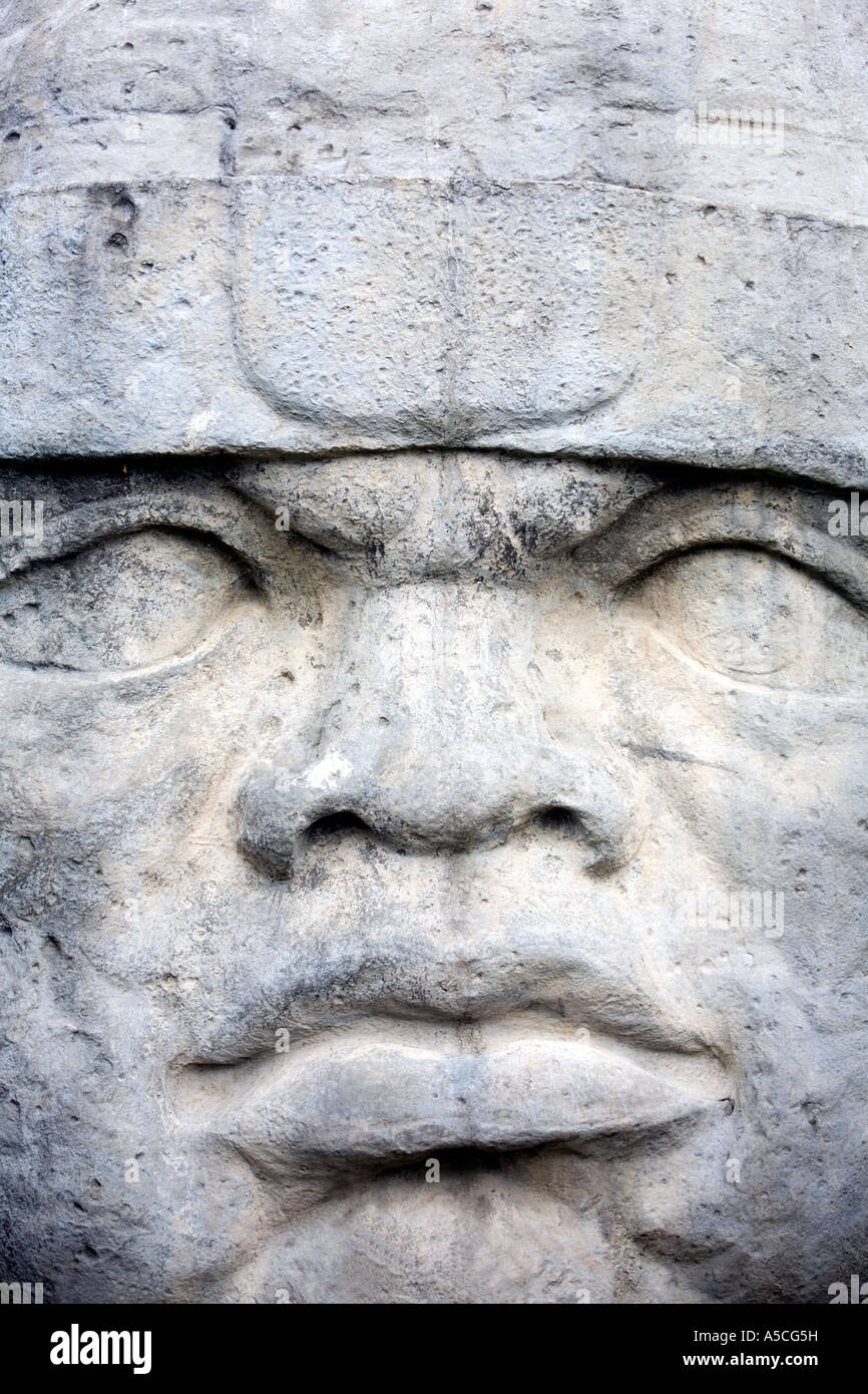 maya stone face carved in rock Stock Photo - Alamy