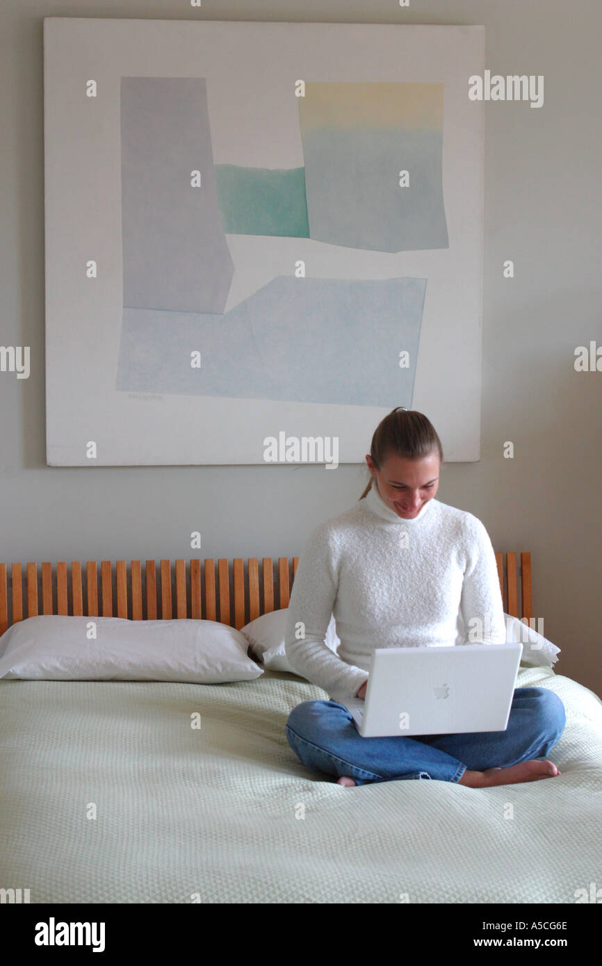 Woman woking on Laptop Computer at Home Model Release Stock Photo - Alamy