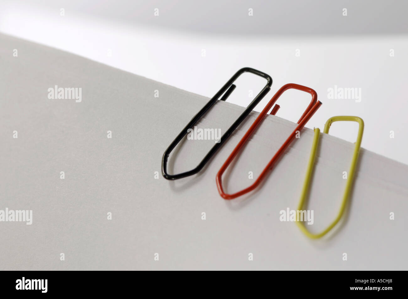 Three paperclips in German national colours Stock Photo - Alamy