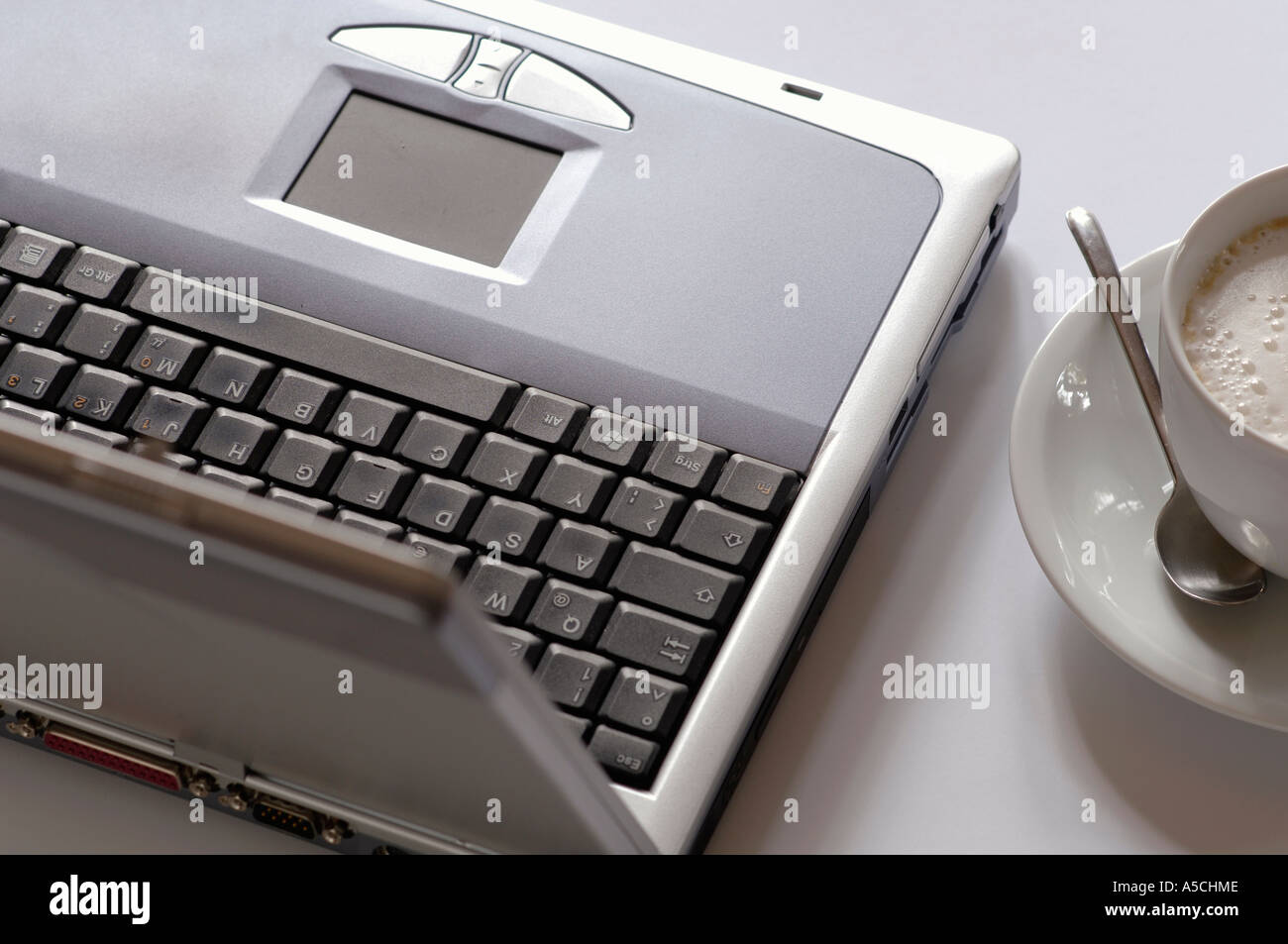 Laptop and coffee cup Stock Photo - Alamy