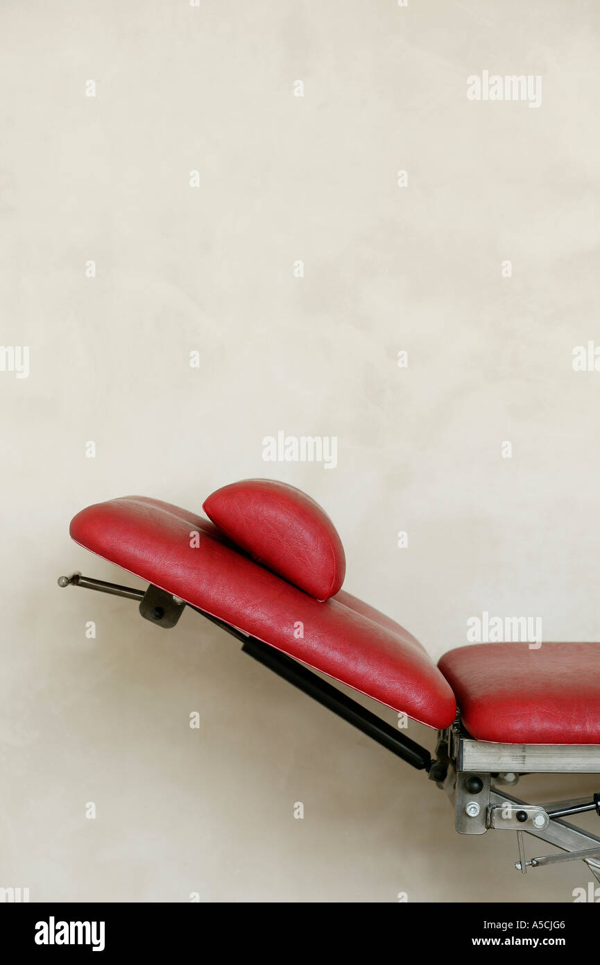 Red reclining chair Stock Photo - Alamy