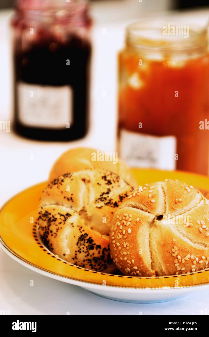 Breadrolls and jam Stock Photo - Alamy