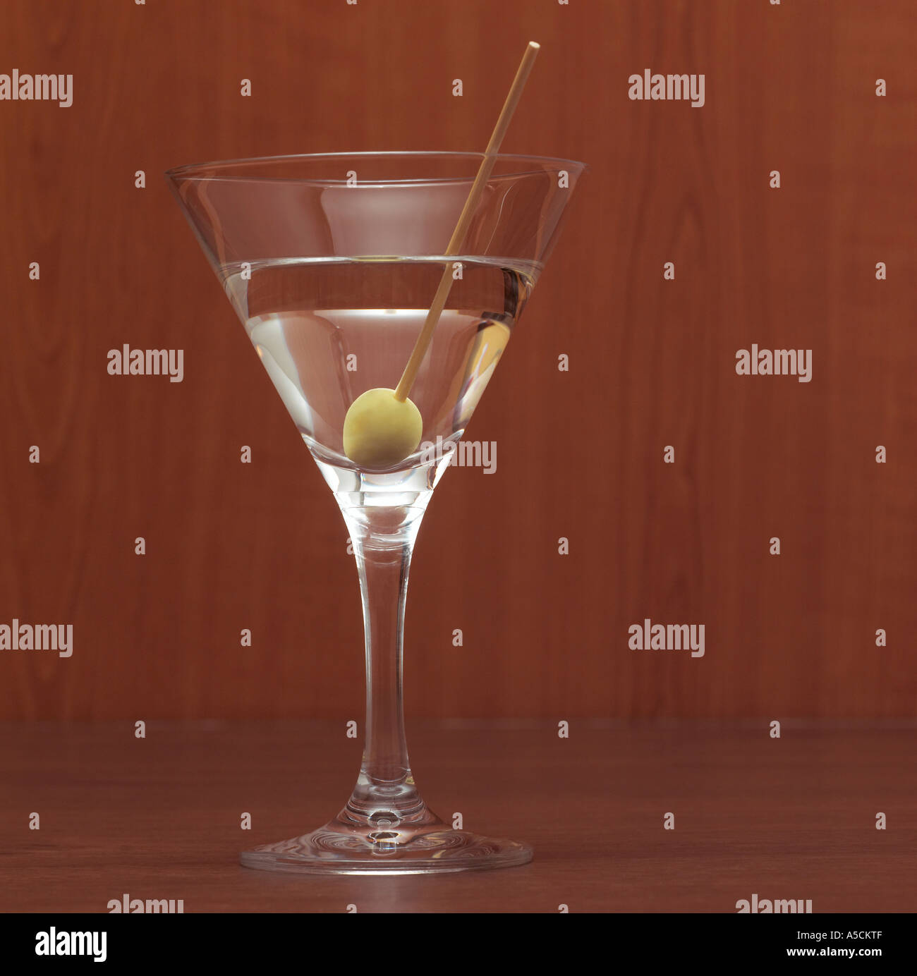 Glass martini olive inside close hi-res stock photography and images ...