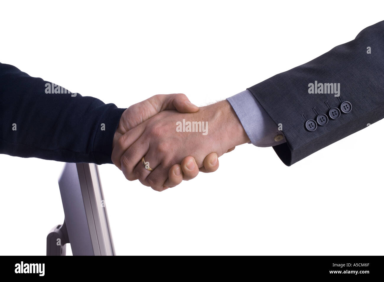 Two computers shaking hands hi-res stock photography and images - Alamy