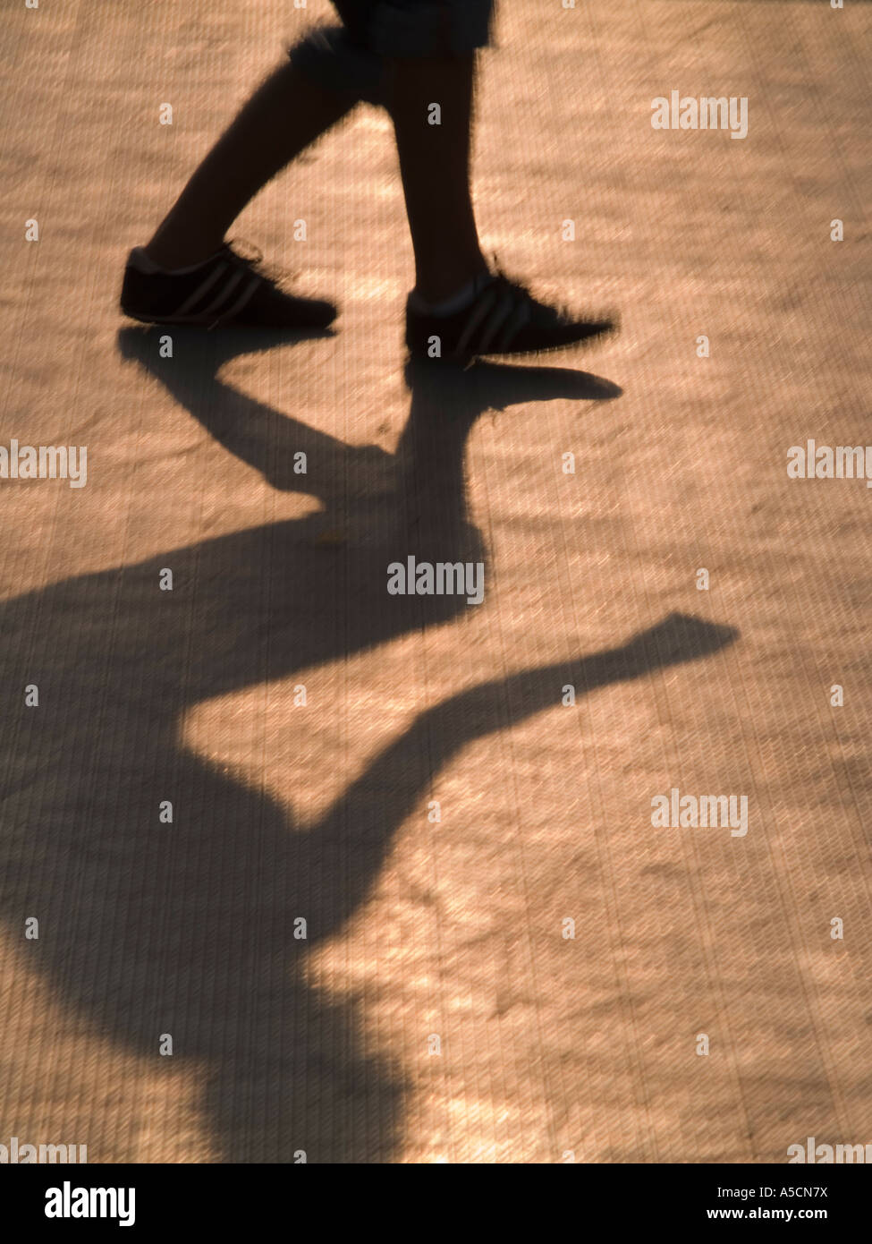 Shadows of people exercising Stock Photo - Alamy