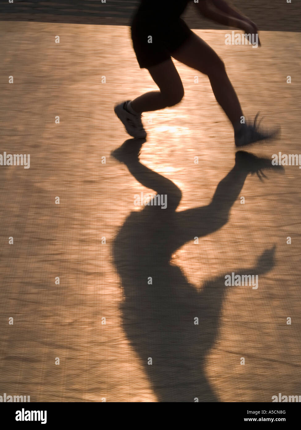 Shadows of people exercising Stock Photo - Alamy