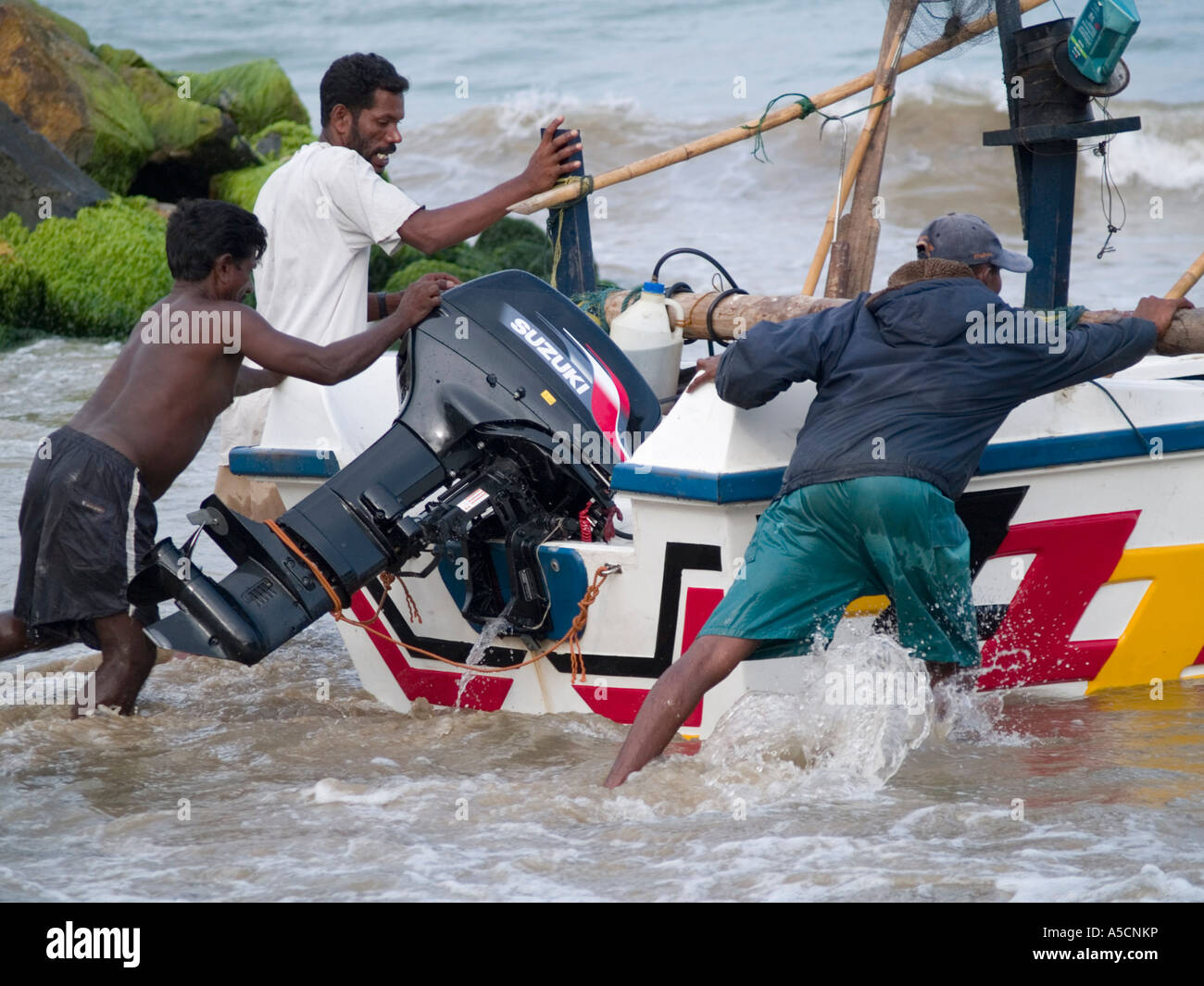 Men pushing boat move hi-res stock photography and images - Alamy
