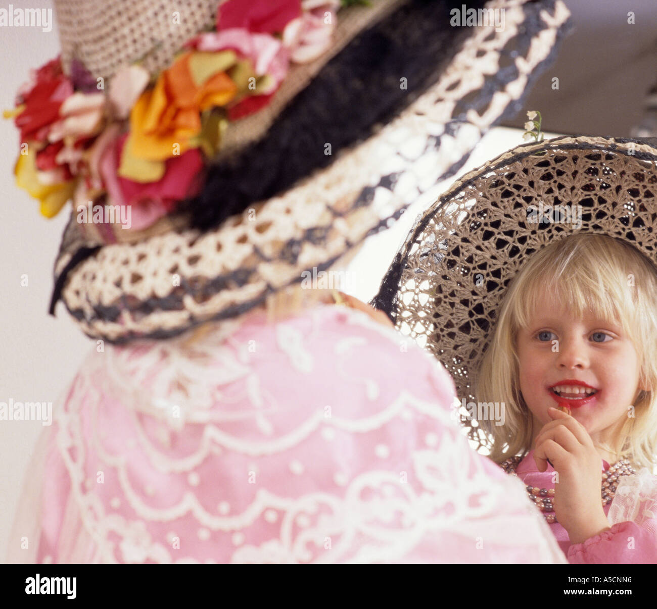 Girls lipstick applying hi-res stock photography and images - Alamy