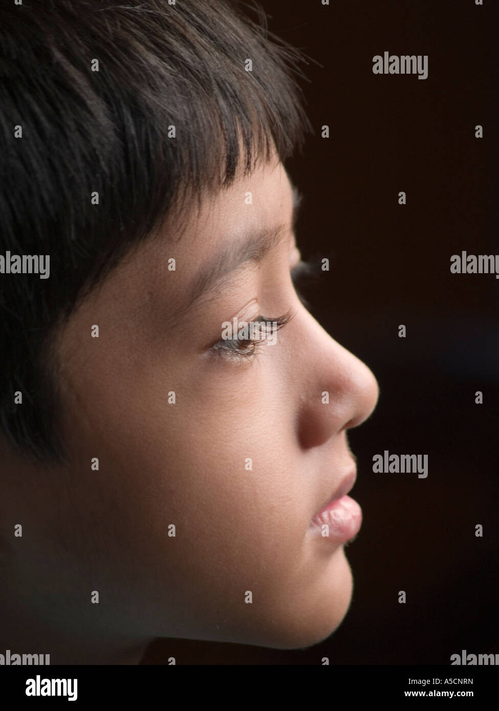 Profile of a boy Stock Photo - Alamy