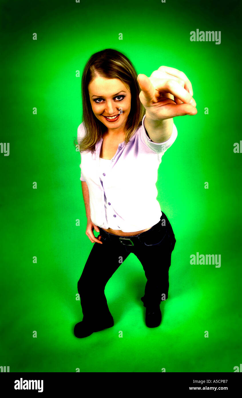 Teen girl pointing at camera Stock Photo - Alamy