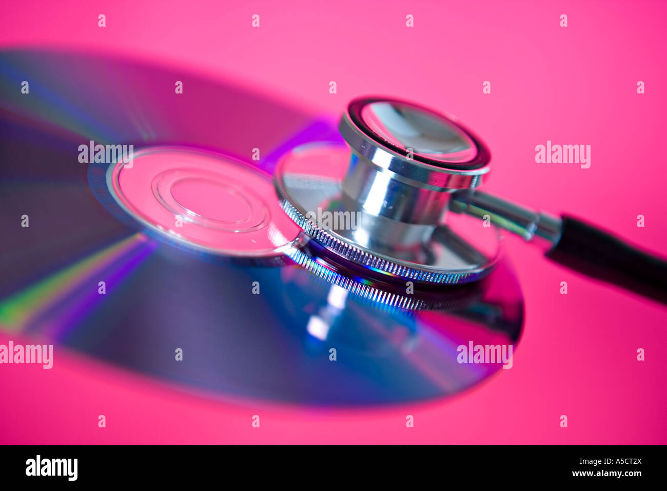 Conceptual image with digital video disc and stethoscope Stock Photo ...
