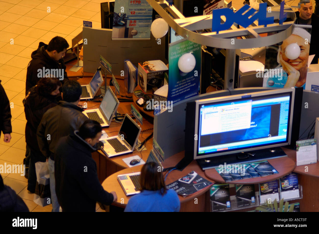 A Dell computer kiosk selling their products to shoppers at the Queens ...