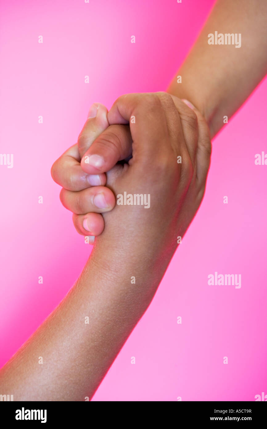 Children’s hands with vibrant pink background Stock Photo - Alamy