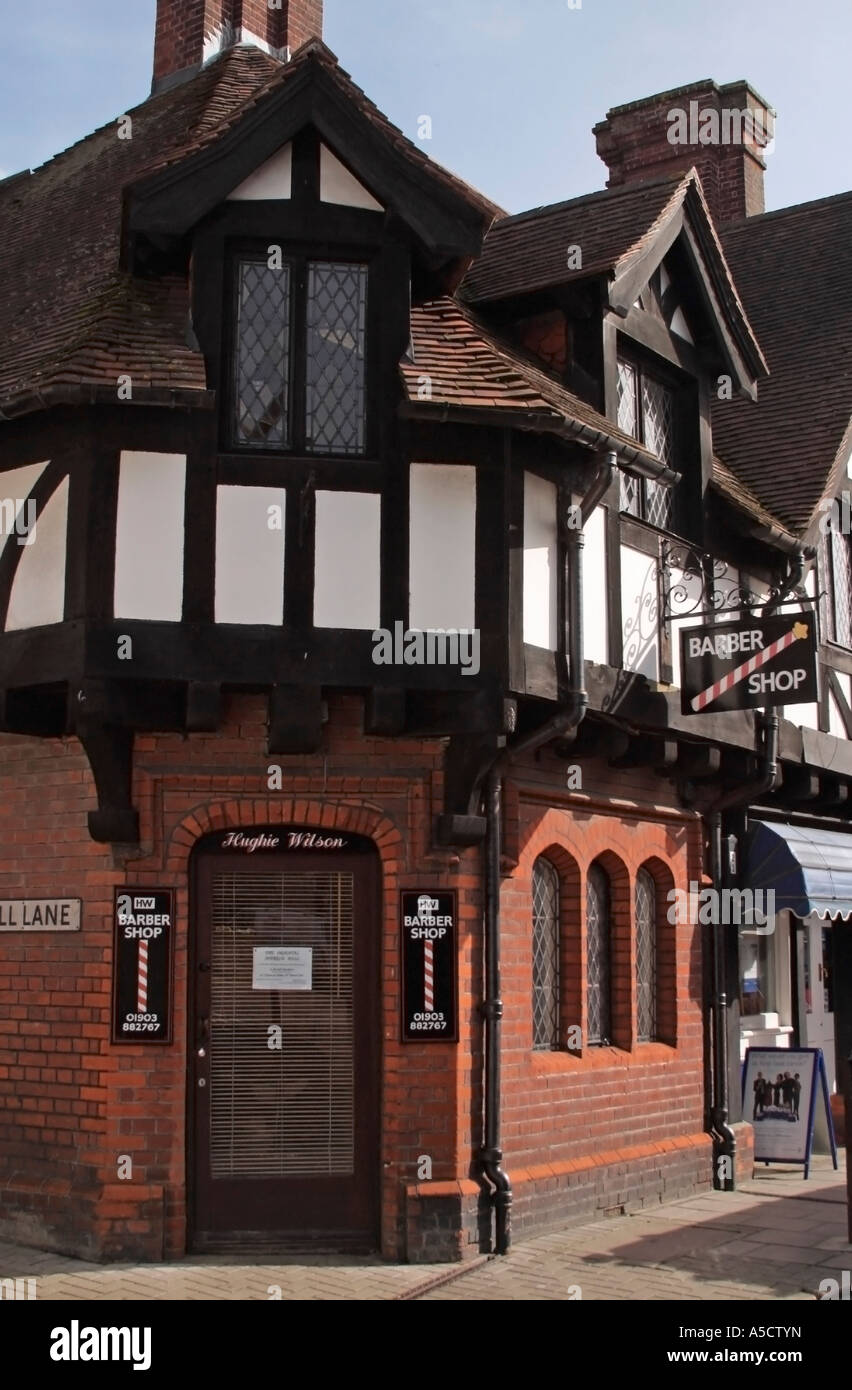 Traditional English barber shop in half-timbered building in Arundel ...