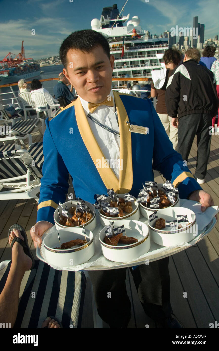 Cruise ship waiter serving drinks aboard the Holland America Line Veendam in Seattle port Stock ...