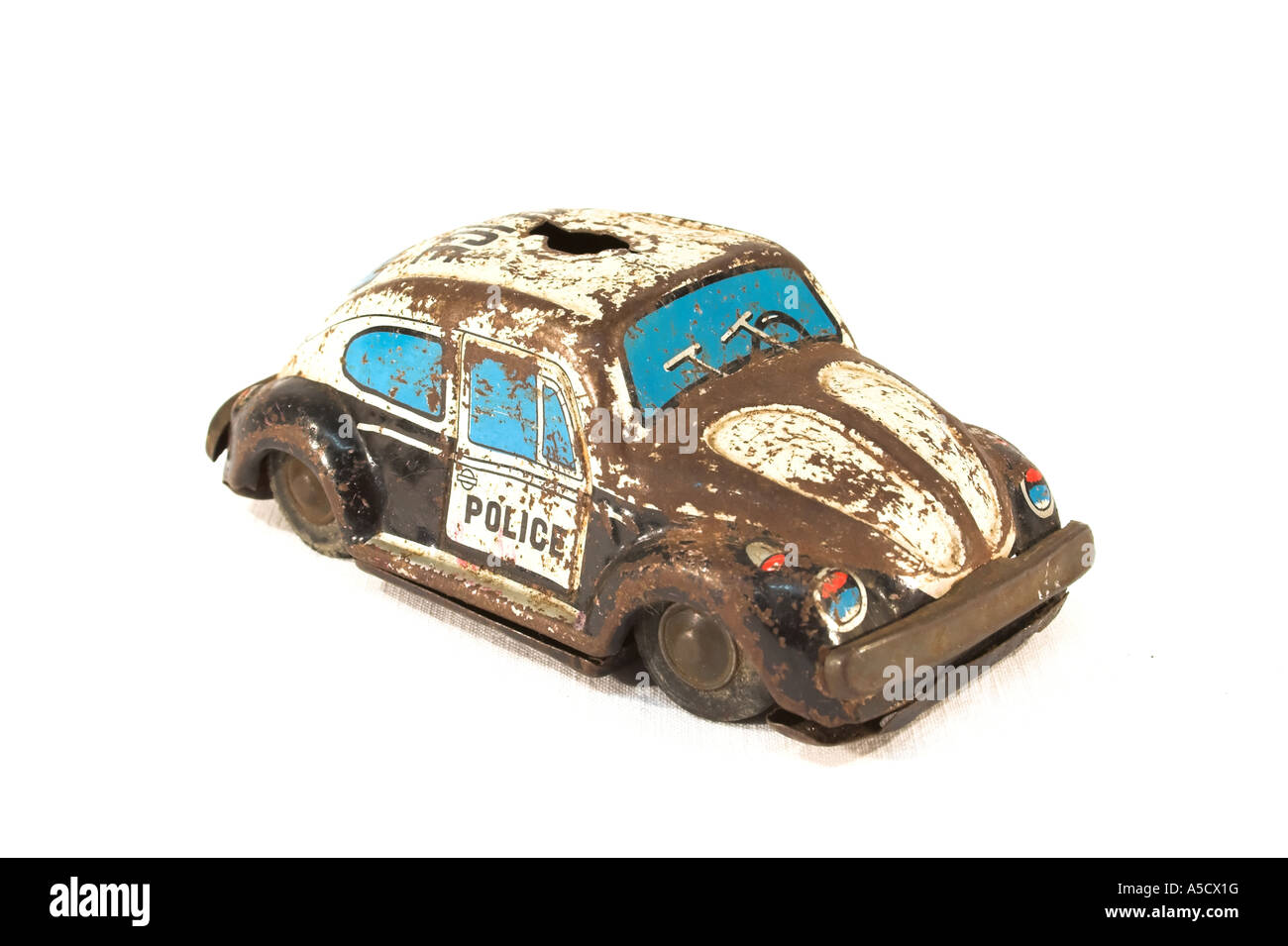 Old, rusty tin toy. Police car Stock Photo - Alamy