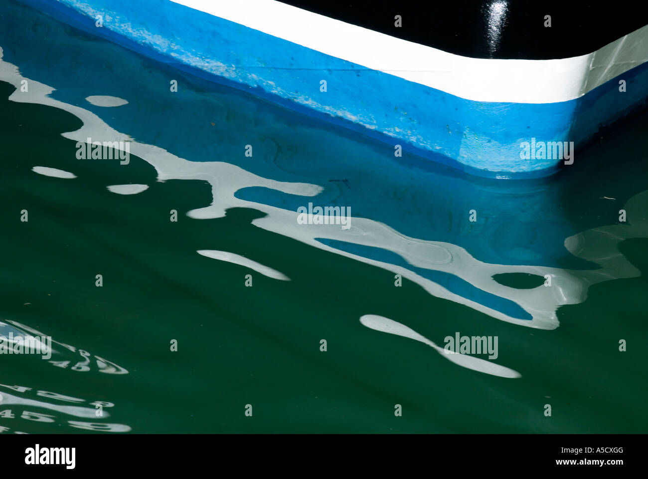 Blue reflection boat ripple hi-res stock photography and images - Alamy