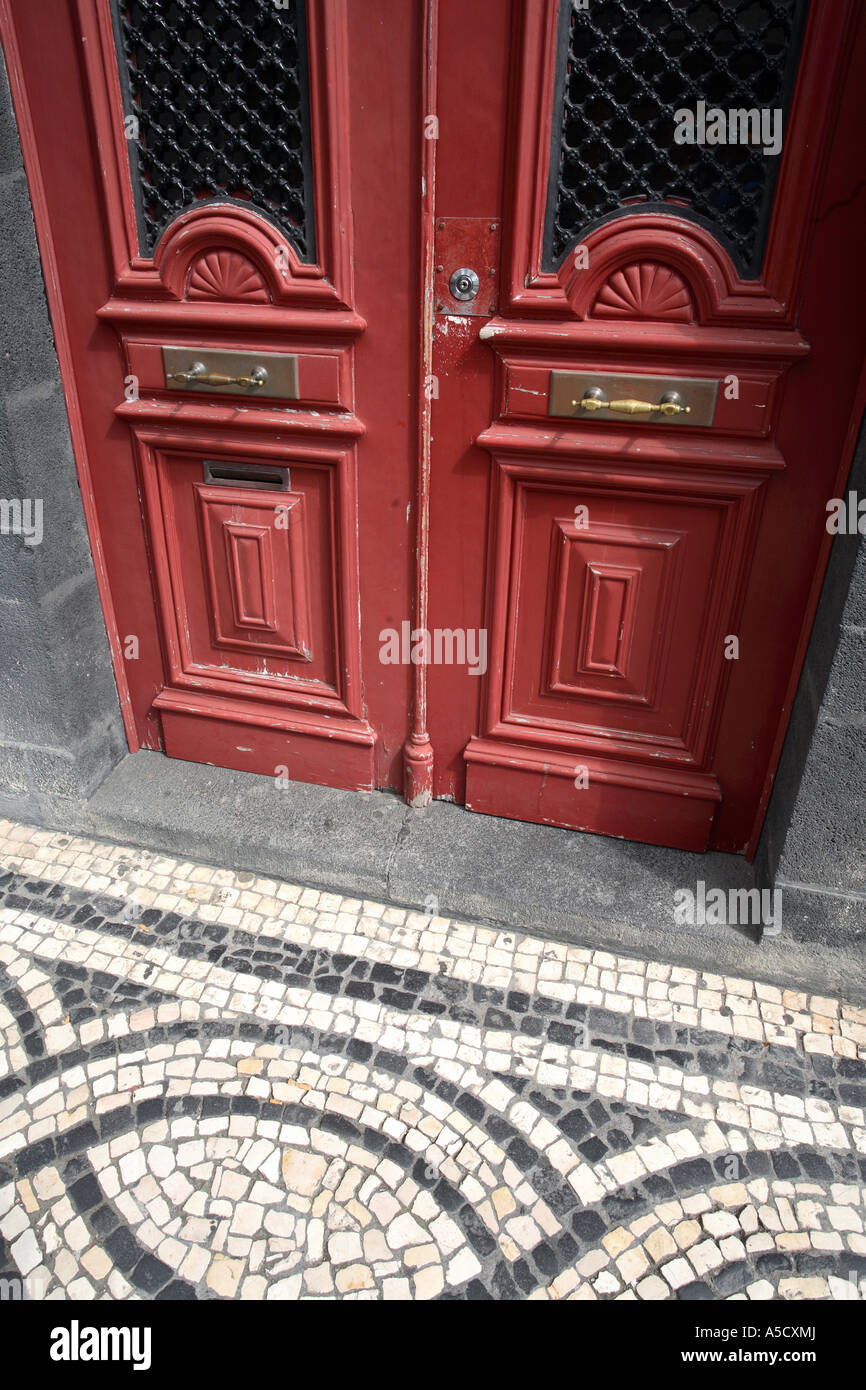 Ornate red doorway with tiled entrance Stock Photo - Alamy