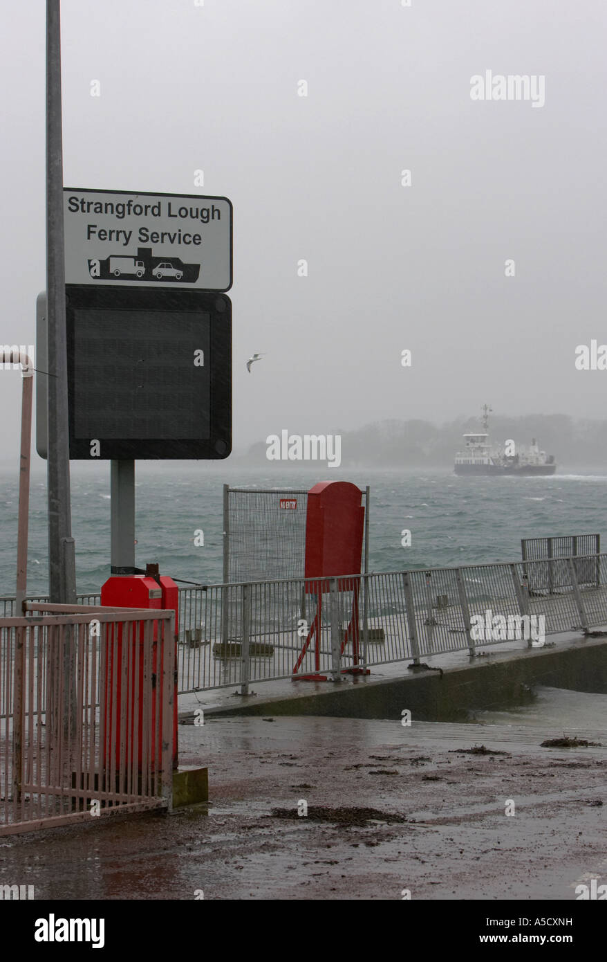 portaferry ferry pier with strangford lough ferry service sign with ...