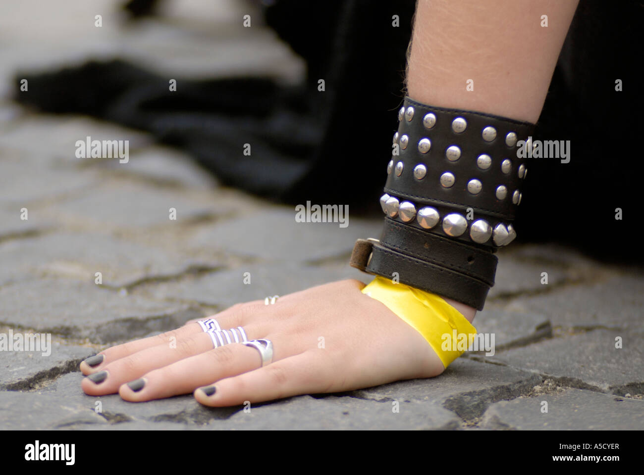 Female hand with heavy metal jewelry during Concert in Piata Mare ...