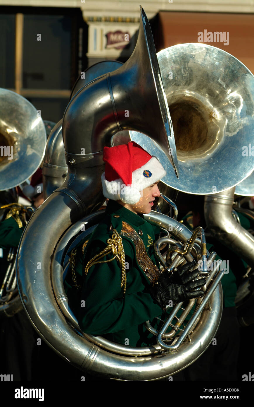 Man playing tuba bass during a Christmas parade Stock Photo - Alamy