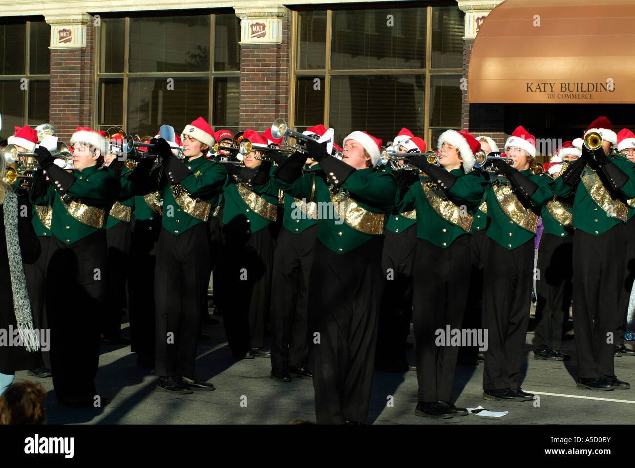 Band playing trumpets during a Christmas parade Stock Photo - Alamy