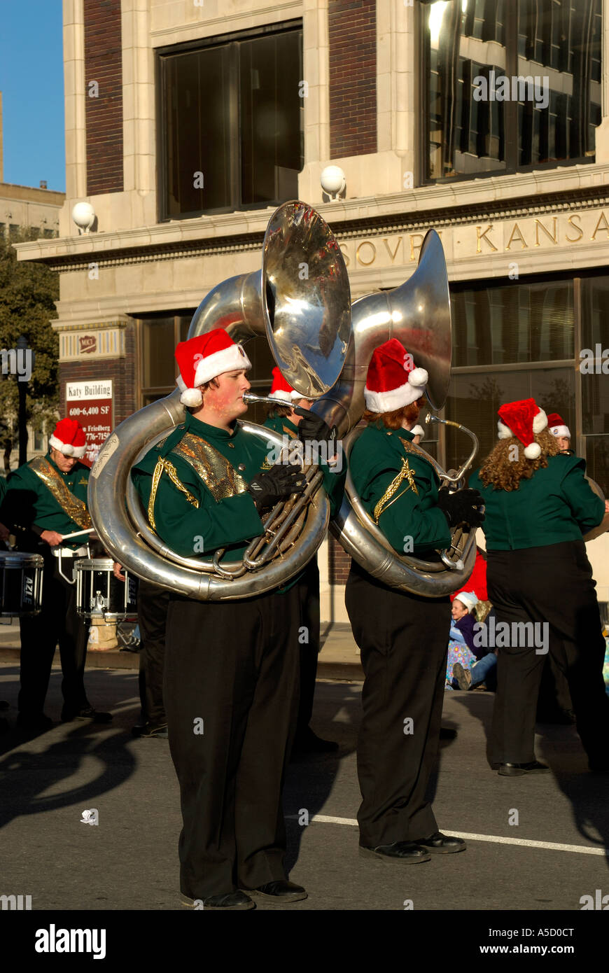 Men playing tuba bass during a Christmas parade Stock Photo - Alamy
