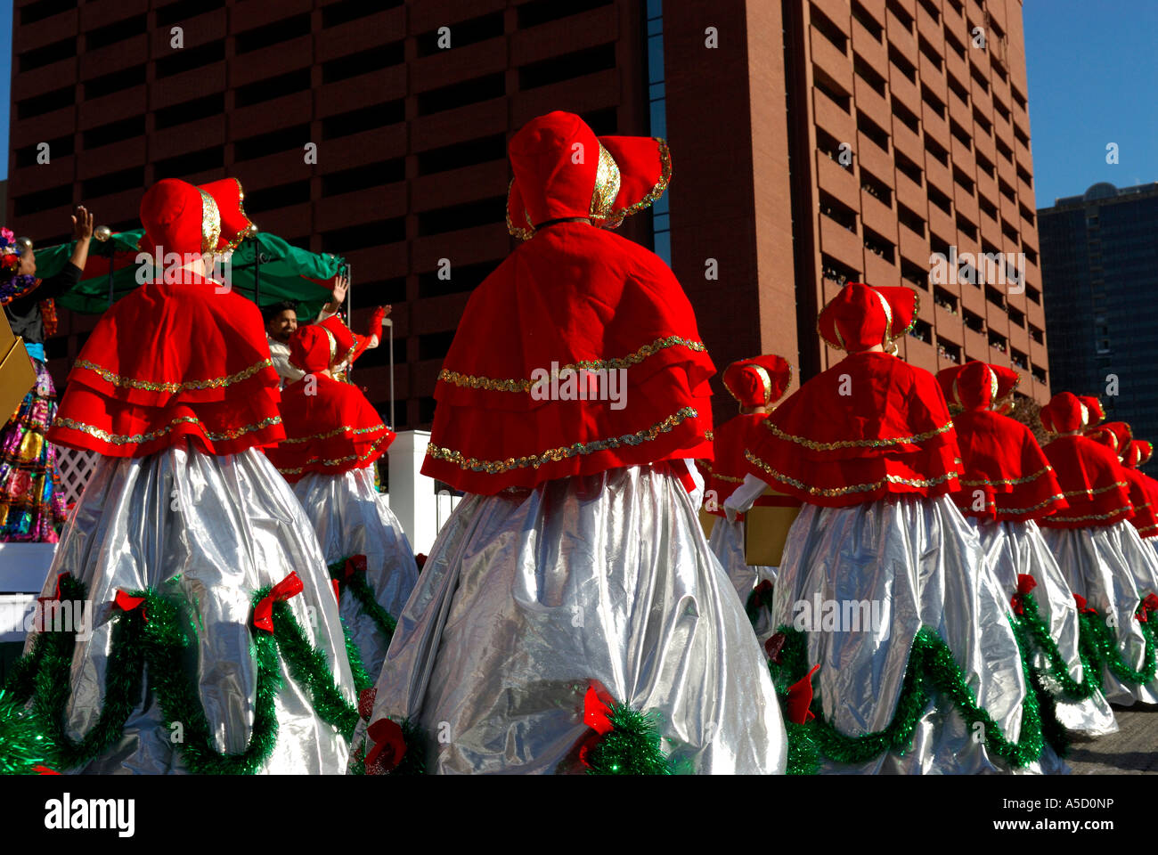 Women wearing little red riding hoods during a parade Stock Photo - Alamy