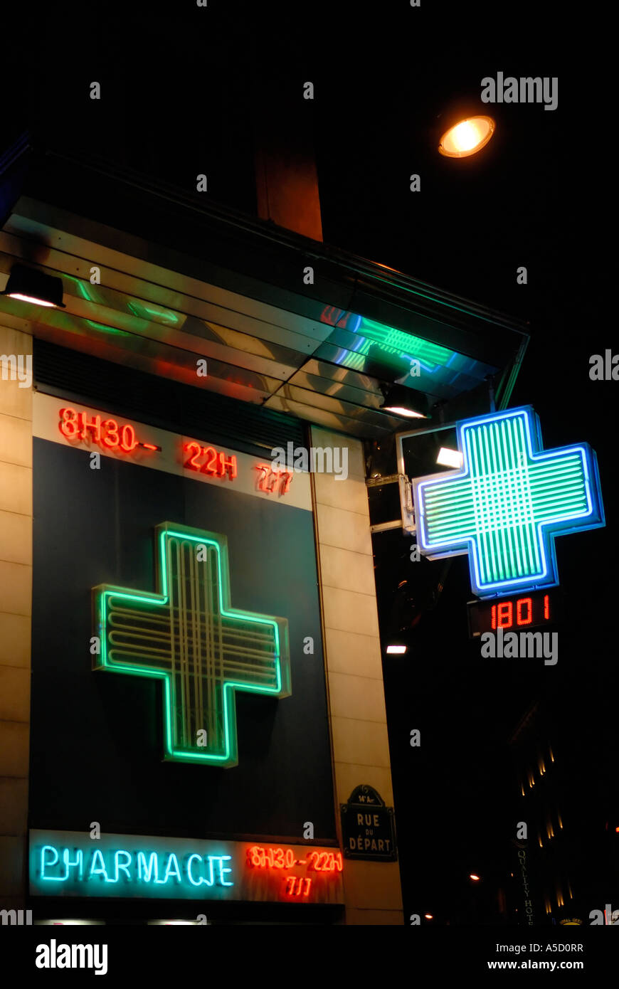 Health signs at night Paris France Stock Photo - Alamy