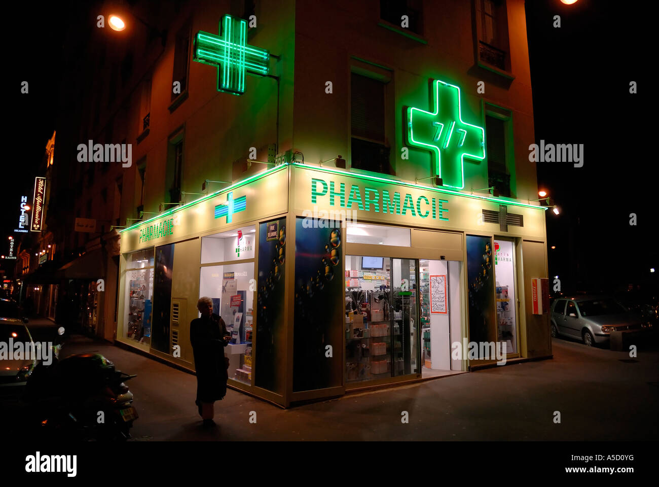 Health signs at night Paris France Stock Photo - Alamy