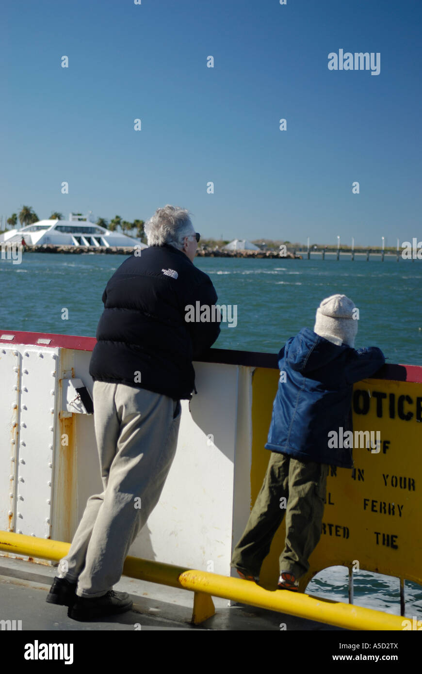 Two people looking the Gulf of Mexico from a ferry Stock Photo - Alamy