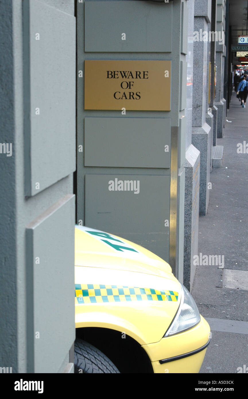Beware of cars sign Stock Photo - Alamy