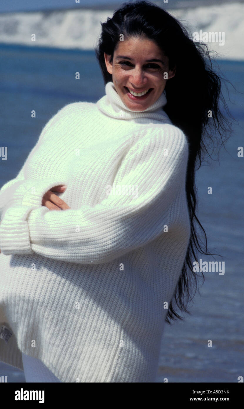 portrait heavily pregnant anglo-asian woman on beach Stock Photo - Alamy