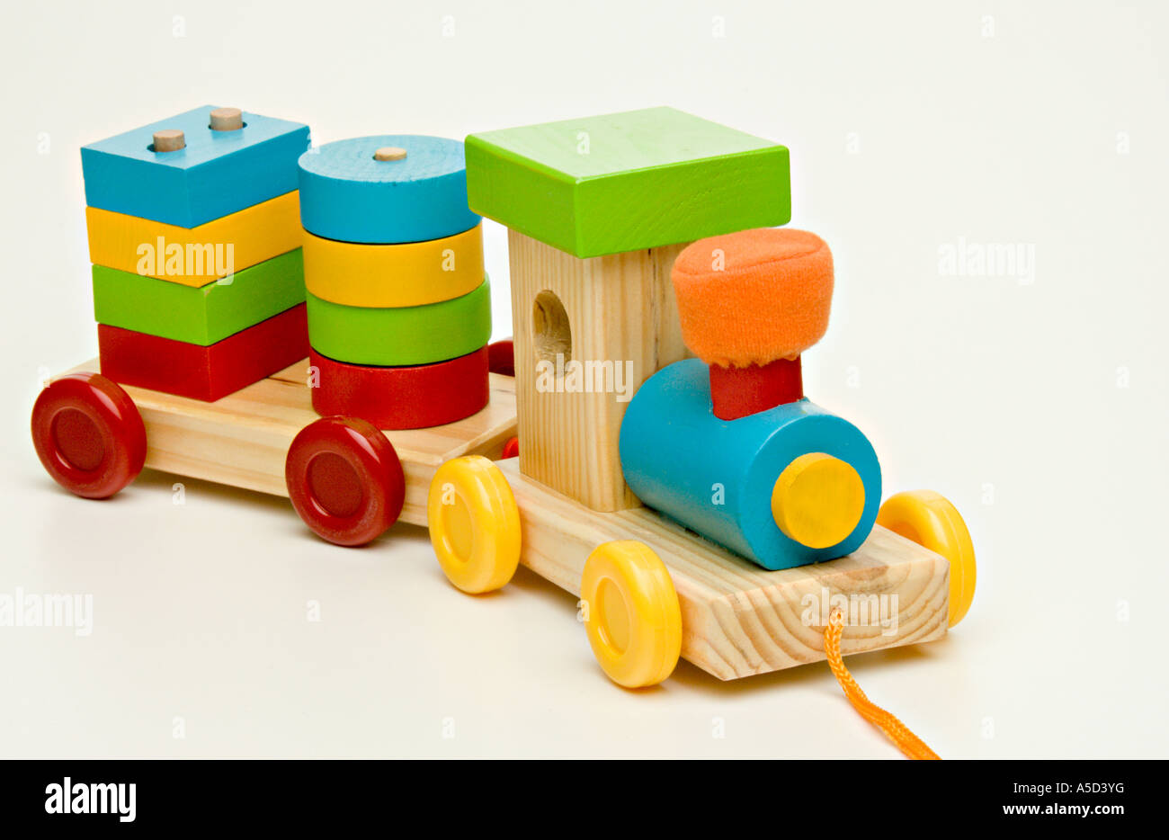 Child's colourful educational Wooden construction toy train Stock Photo ...